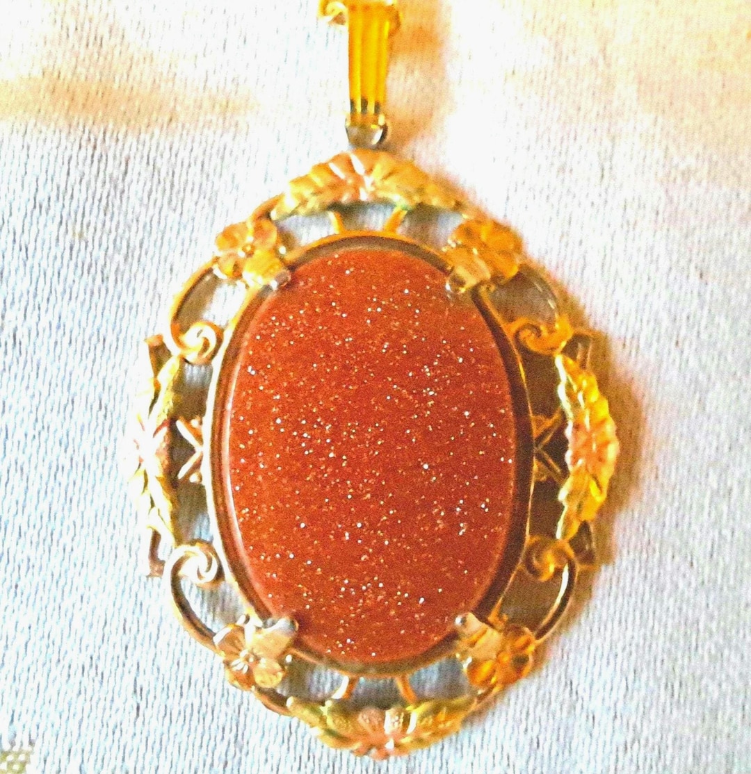 Vintage Victorian Goldstone Pendant Necklace: Floral Embossed Goldtone ...