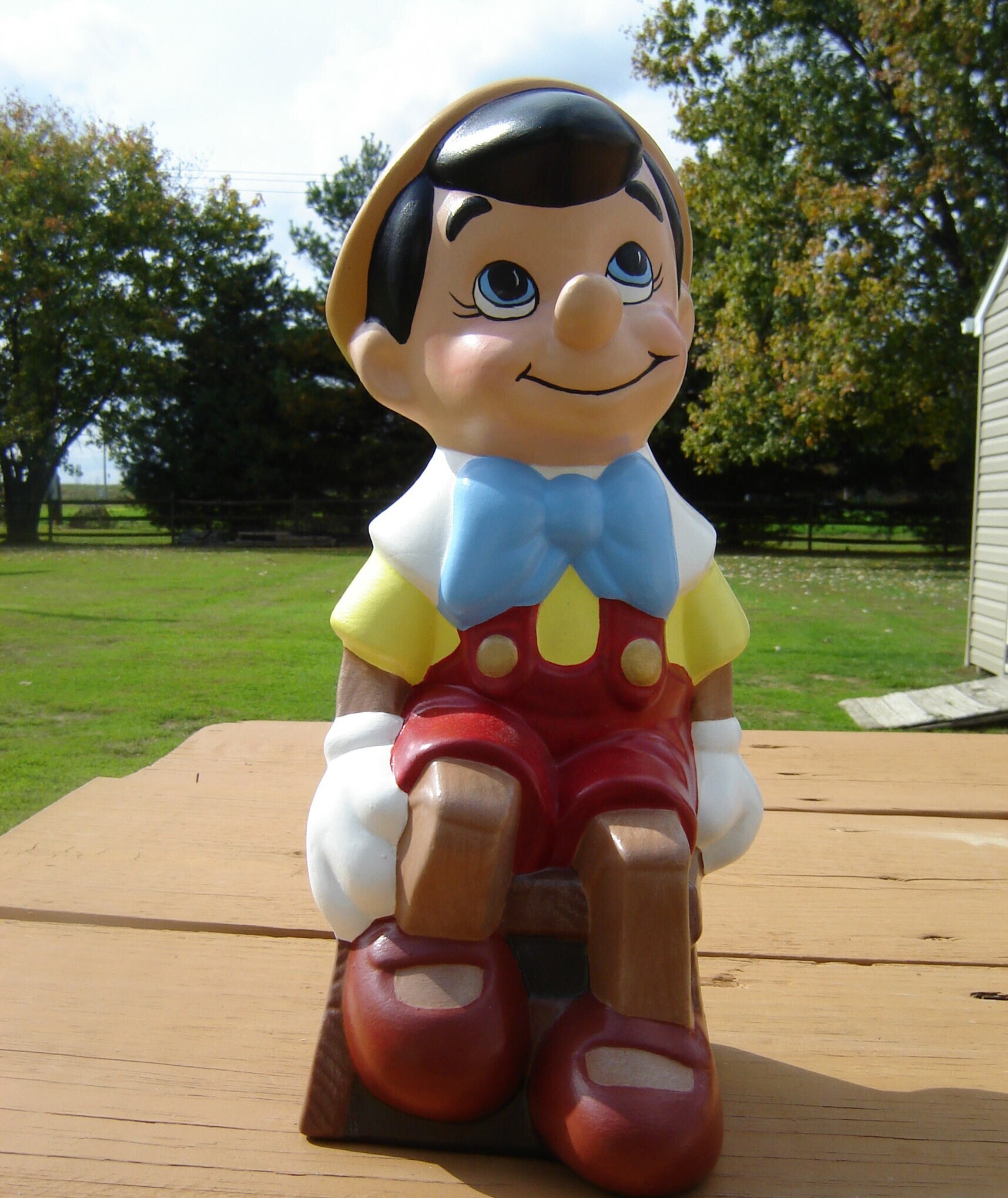 Disney's Pinocchio Sitting on Wooden Seat - Etsy