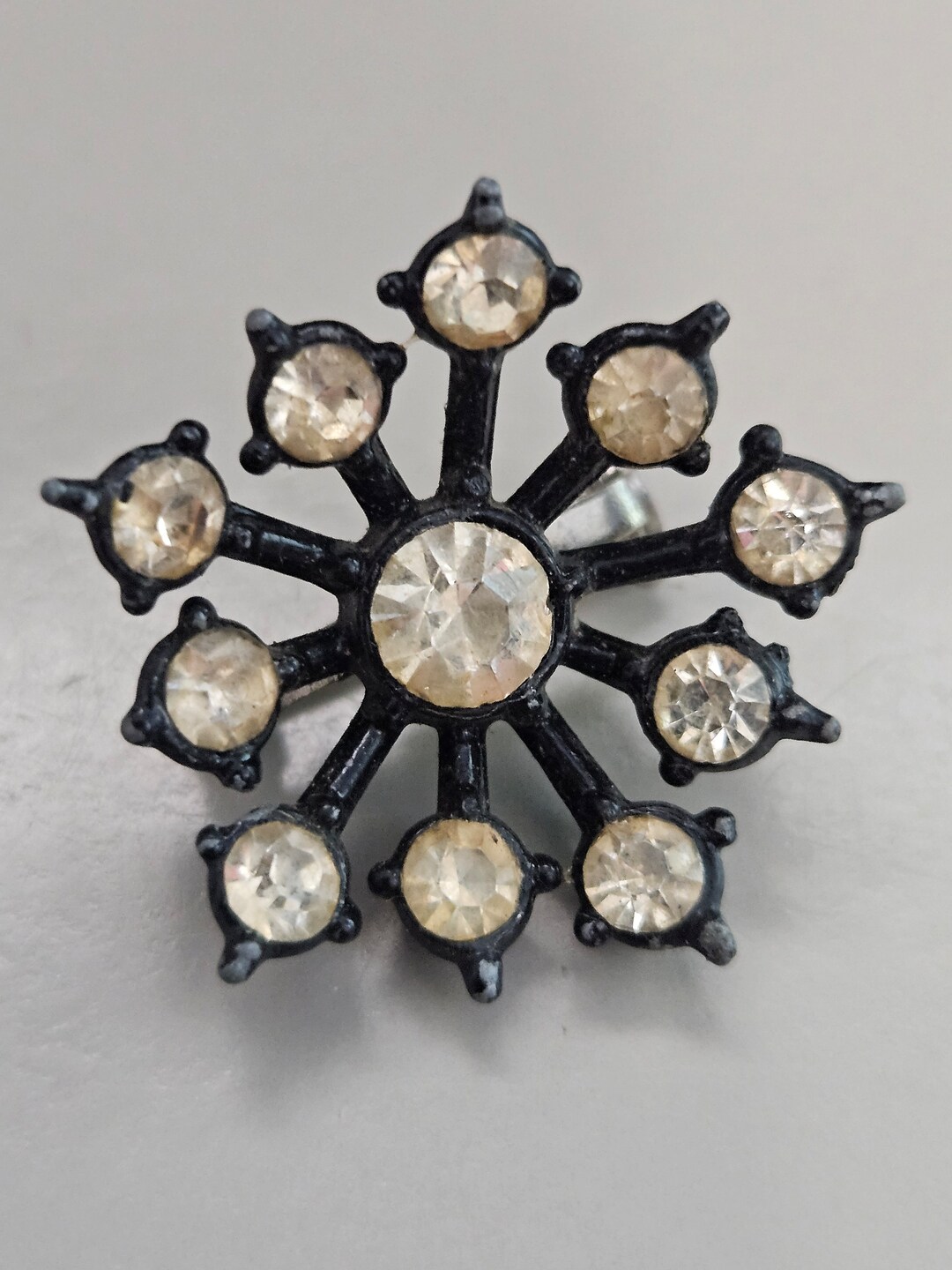 Vintage Black Metal Starburst Brooch/pin With Rhinestones - Etsy