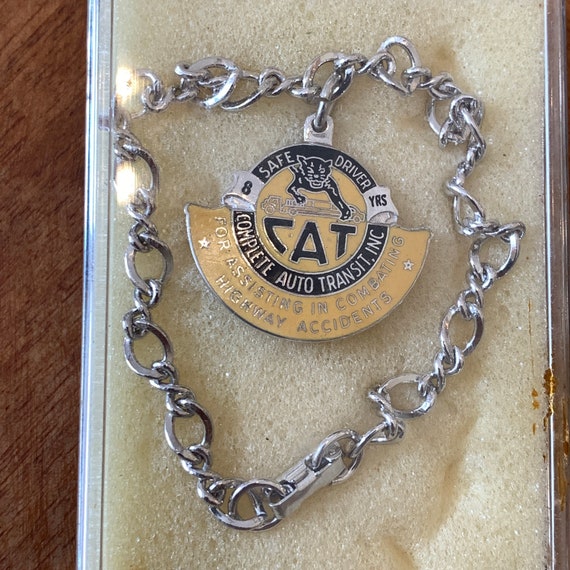 C.A.T. - Vintage Auto Transit Safe Driver Pendant - 8… - Gem