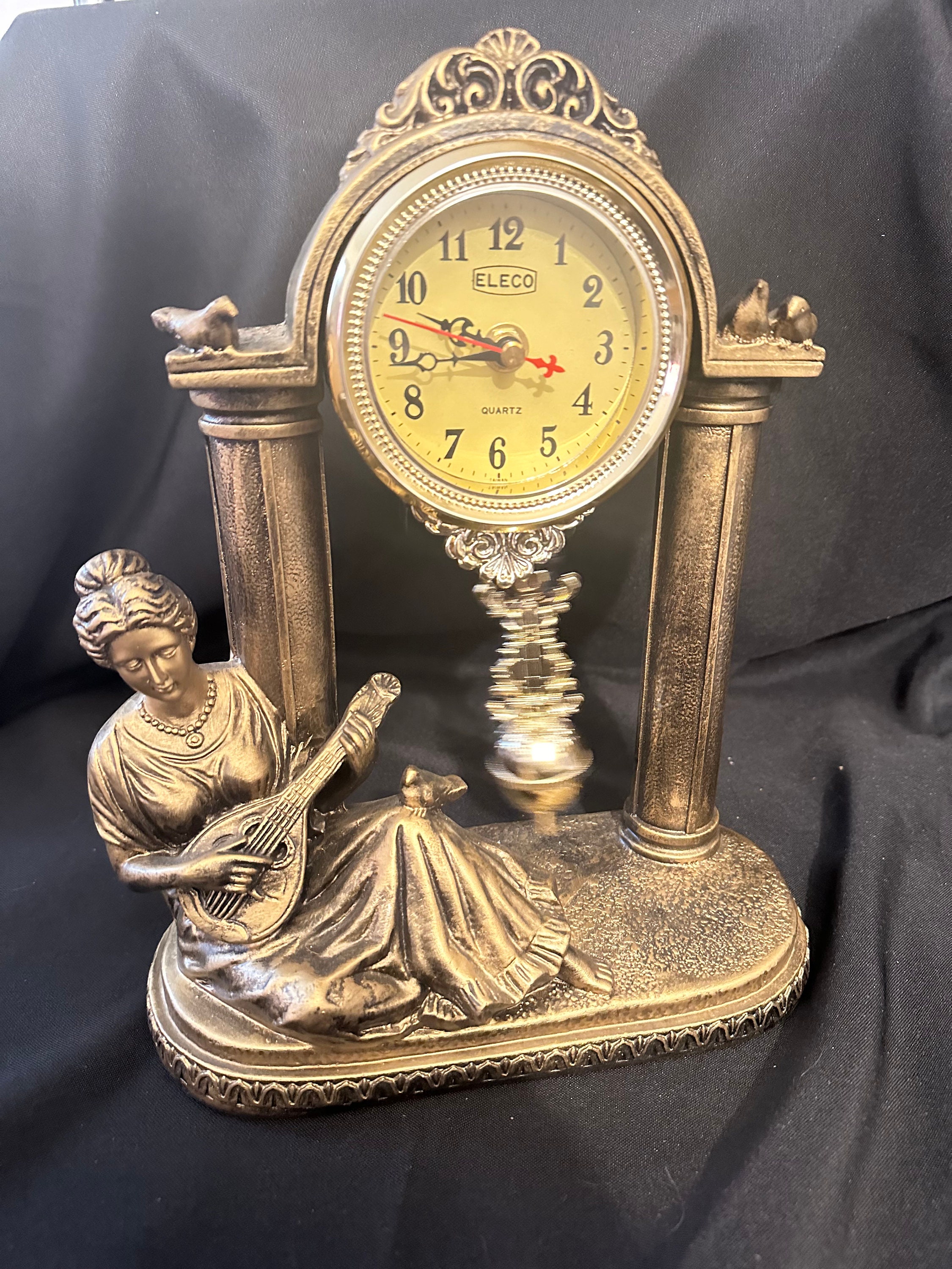 Vintage Eleco Quartz Pendulum Clock Pillars With Woman Playing Guitar ...