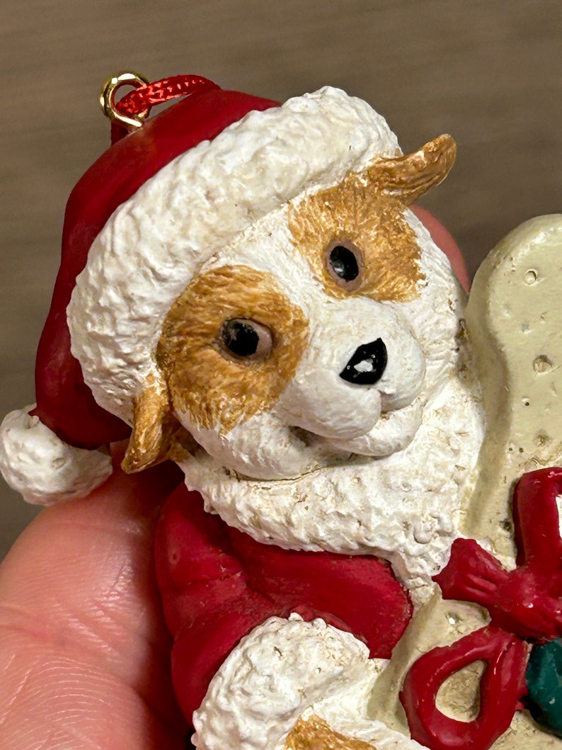 Vintage Whimsical Happy Smiley Corgi Dressed in Santa's Costume Holding ...