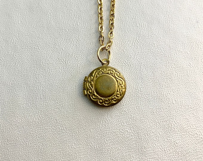 Small Antique Brass LOCKET With Scroll Design on 16
