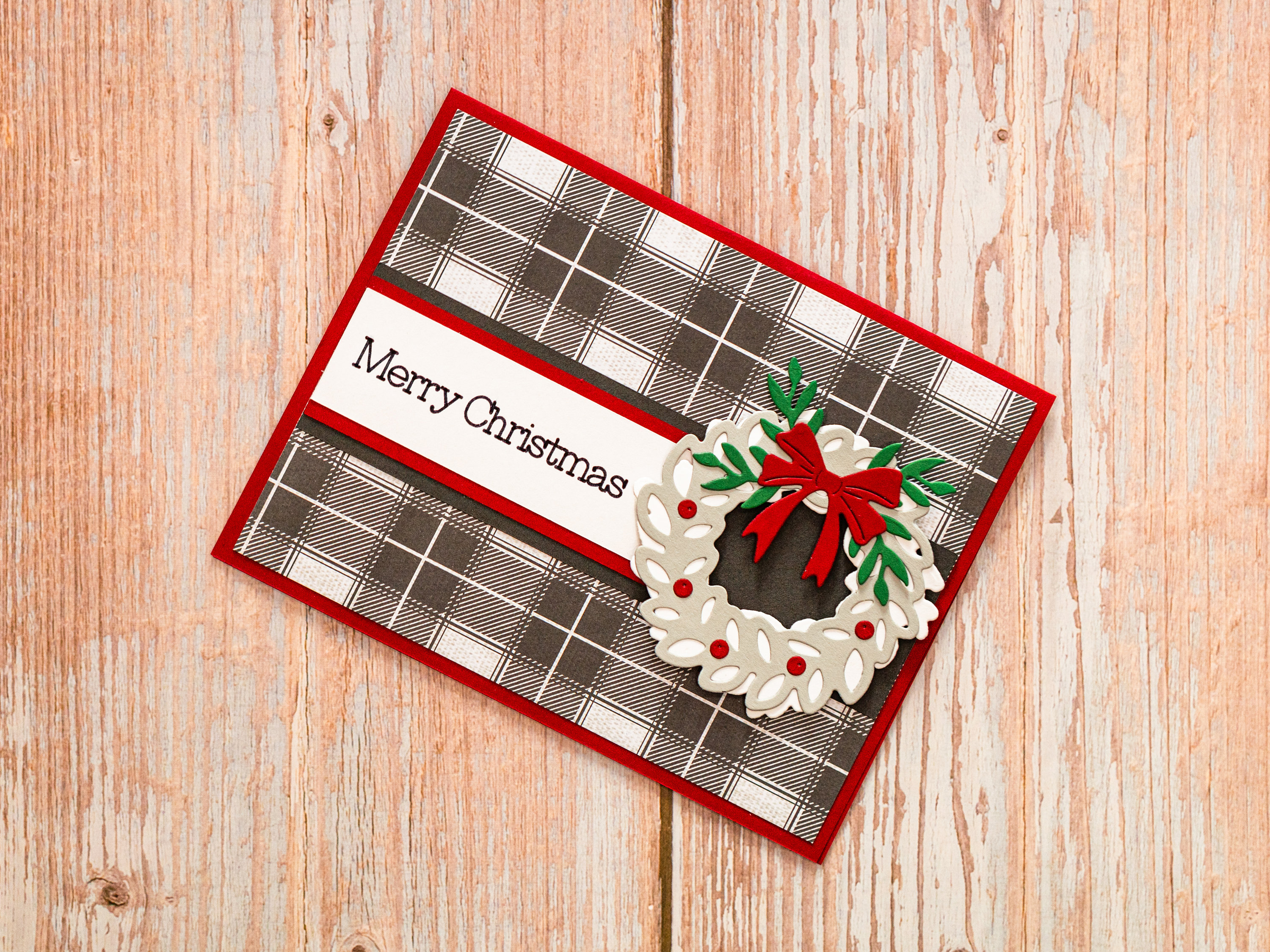 Handmade Merry Christmas Card With Wreath on Plaid Background ...