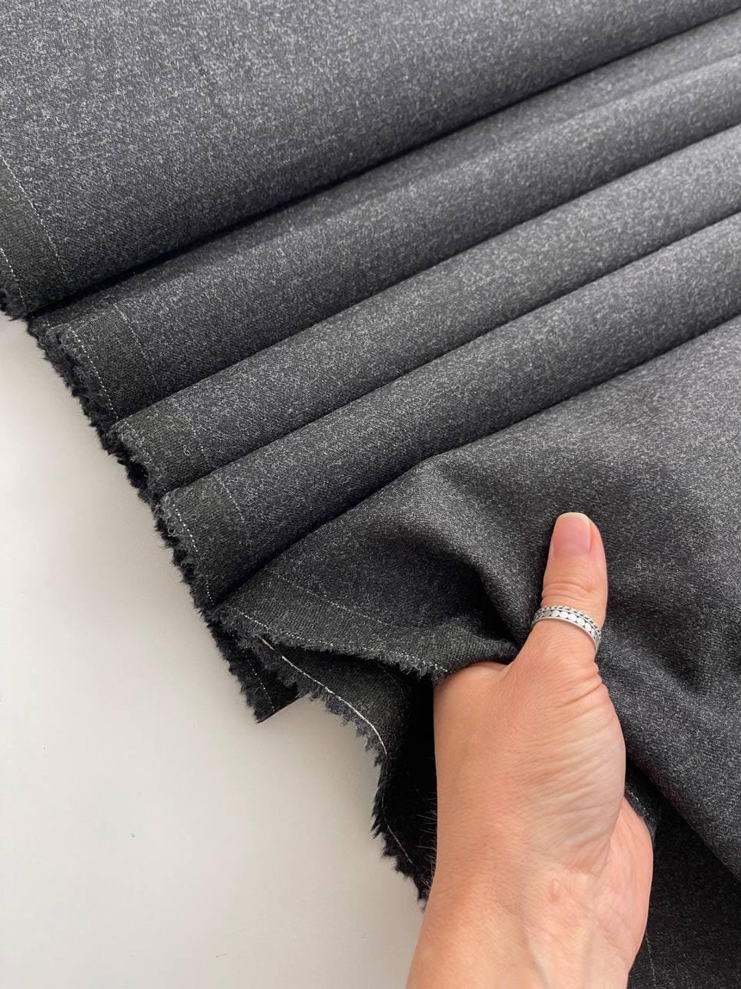 Wool in a Deep Graphite Color. A Fabric With High Elasticity. Wrinkle ...