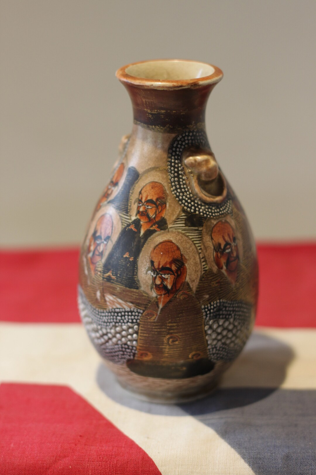 A Thousand Faces Vase Highly Decorated Japanese Ceramic Vase Depicting Multiple Faces and a ...