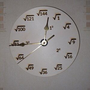 Wooden Analogue Clock With Square Roots as Numbers - 19cm Discs - Laser ...