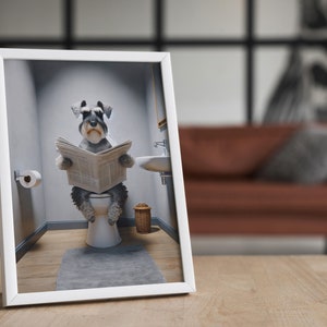 Photograph of a Miniature Schnauzer Reading the Newspaper on the Toilet ...