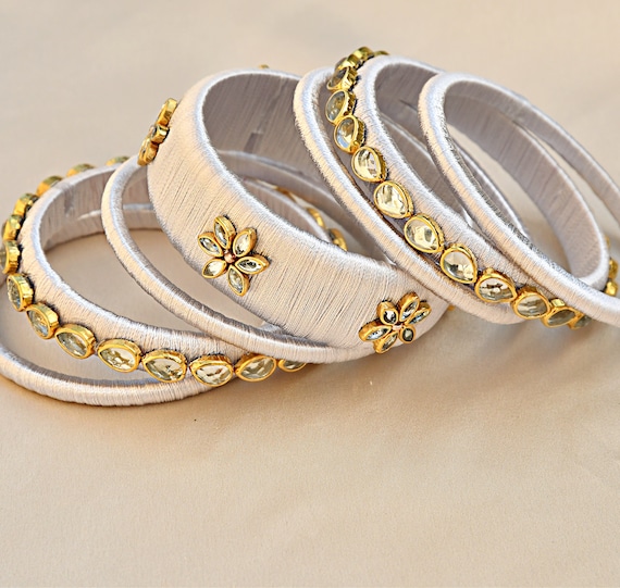 Silver thread bangles store