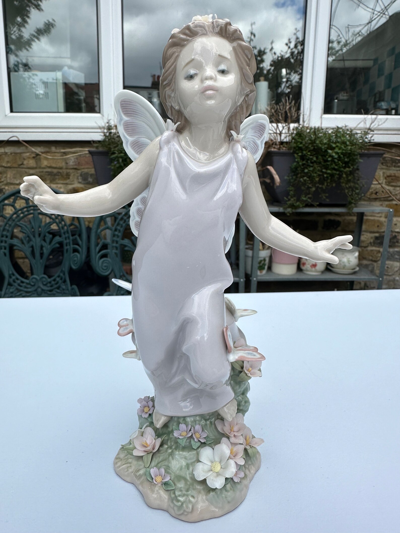 A Lladro 6875 Porcelain Figurine of a Fairy With Butterfly Wings Among ...