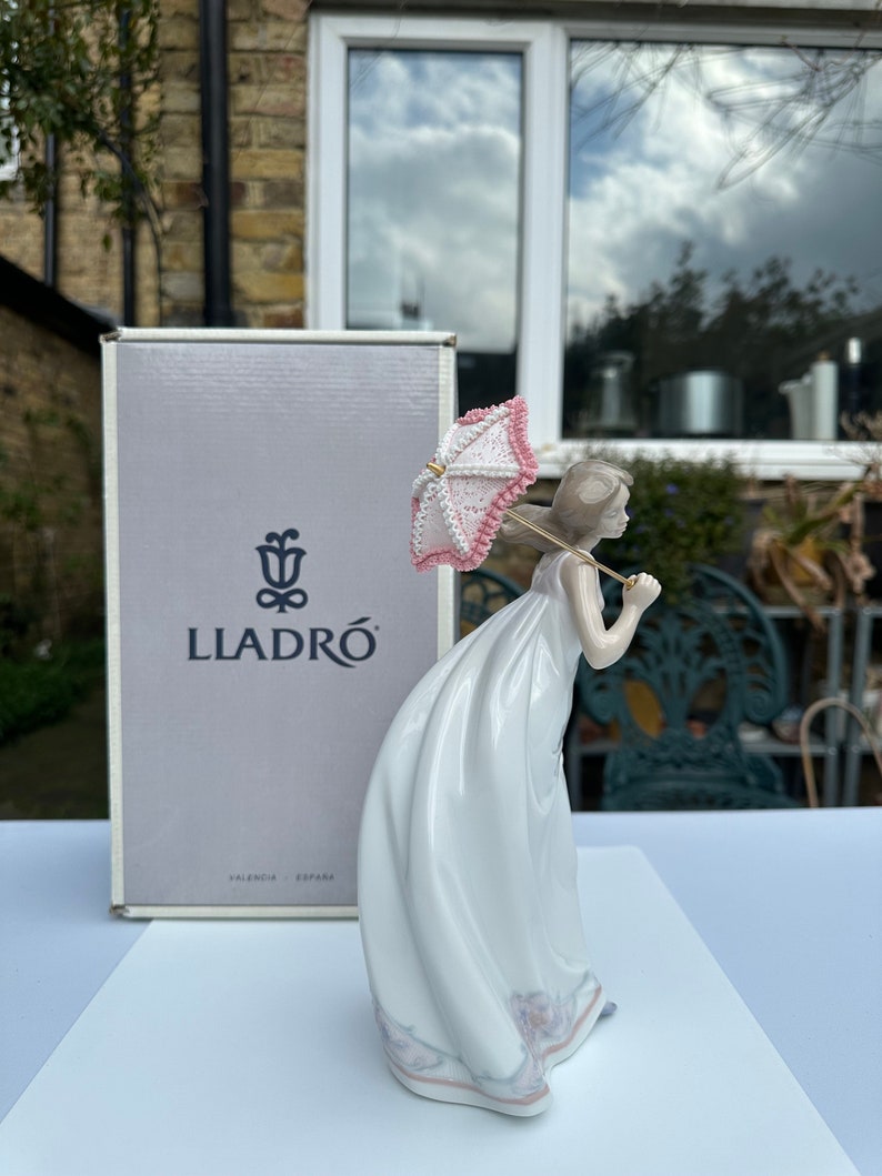 A Boxed Signed Lladro 7636 Afternoon Promenade Porcelain Figurine of A ...