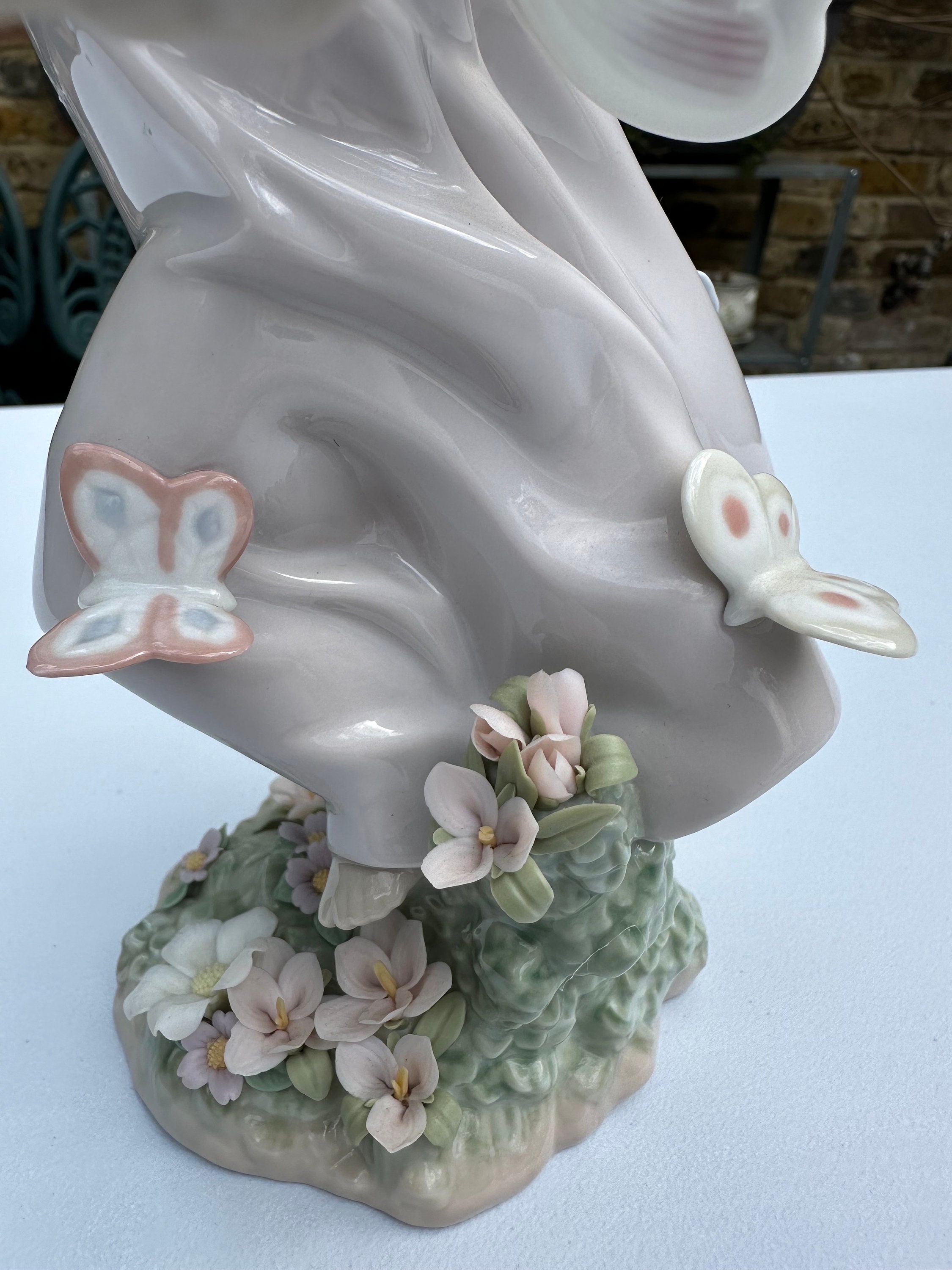 A Lladro 6875 Porcelain Figurine of a Fairy With Butterfly Wings Among ...