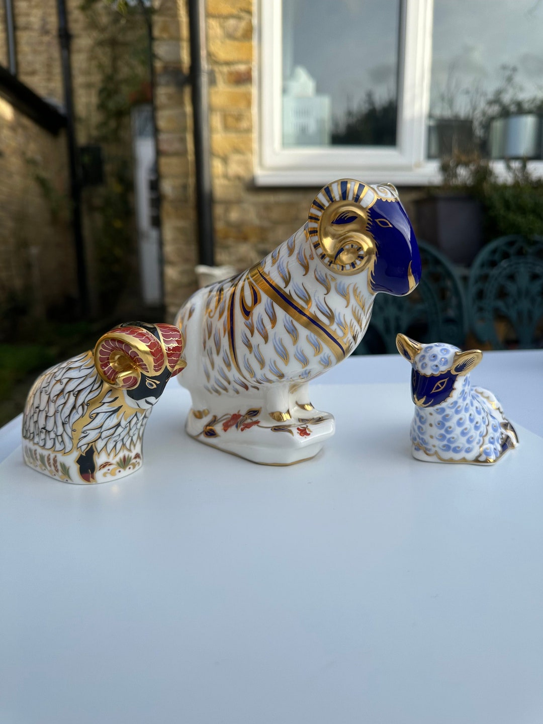 A Group of Royal Crown Derby Paperweights of A Large Ram, A Small Ram ...
