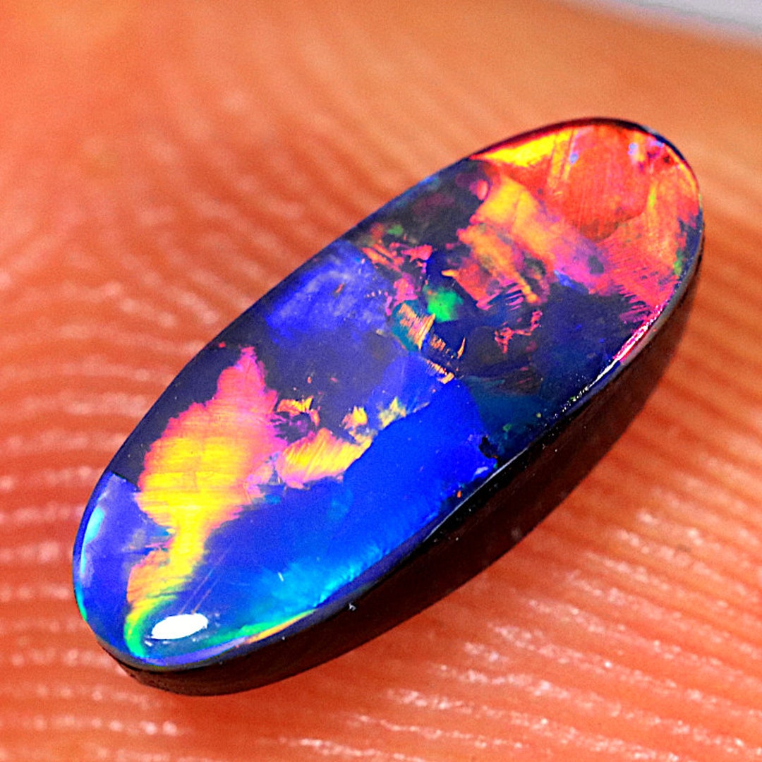 0.7CT Lightning Ridge Opal Doublet, Oval, Black Potch Backing, Bright ...
