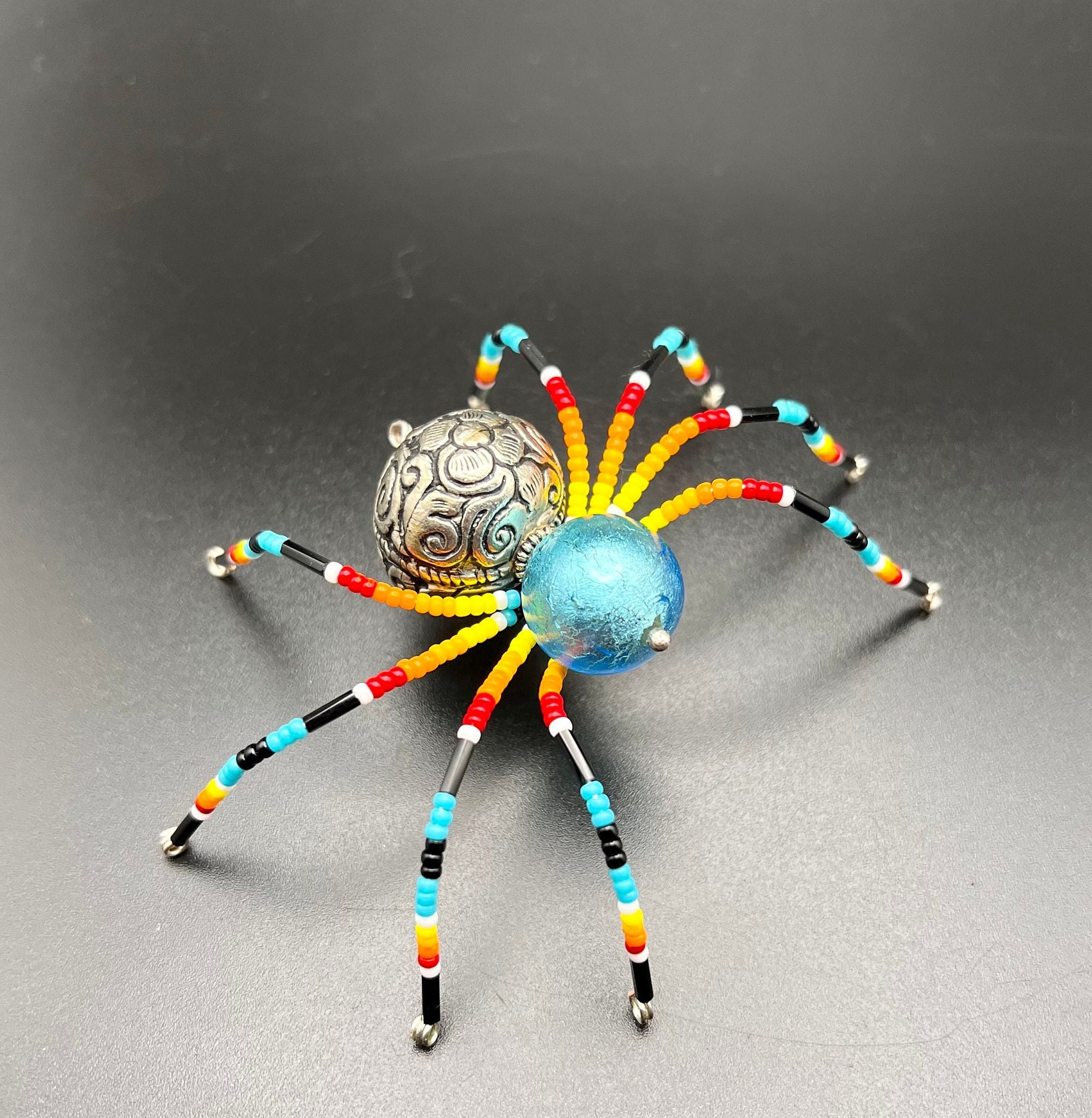 Bright Pattern Spider With Carved Brass Bead - Etsy