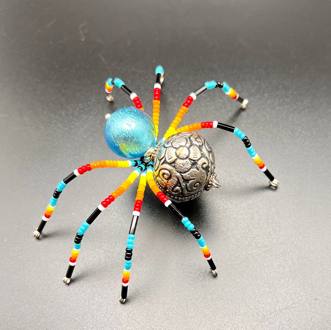 Bright Pattern Spider With Carved Brass Bead - Etsy
