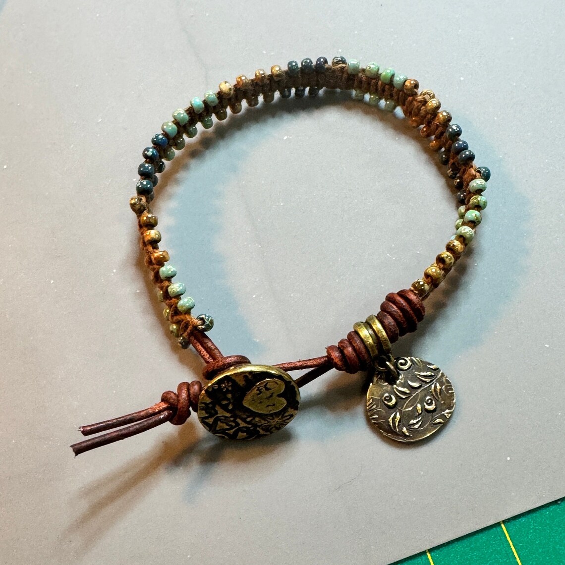 Brown Leather Bohemian Macrame Bracelet With Seed Beads Around Black ...