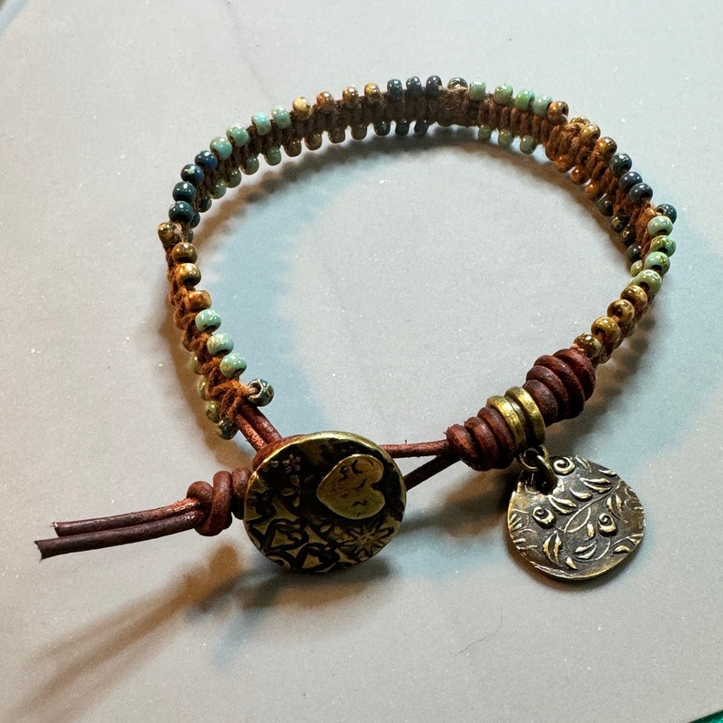 Brown Leather Bohemian Macrame Bracelet With Seed Beads Around Black ...