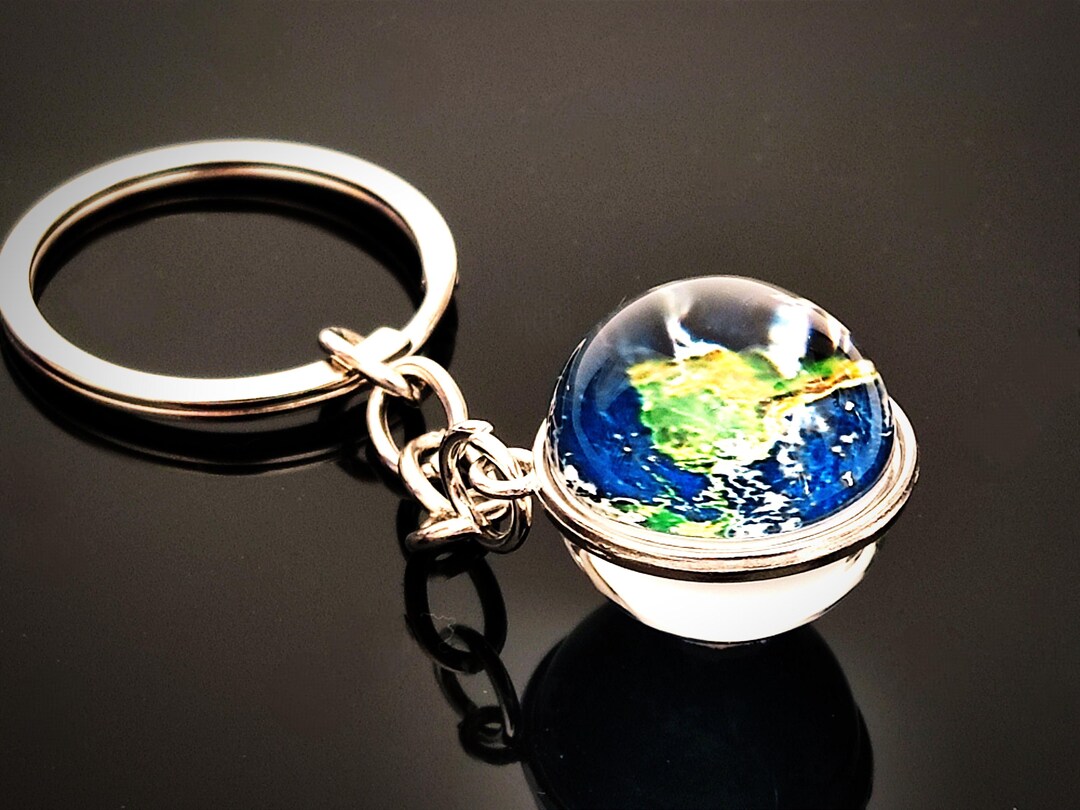 Earth Key Ring in Glass and Shiny Metal in the Evening, Ideal End-of ...