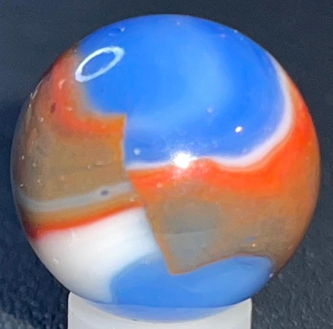 Vintage Marble King Blended Spider-man Chocolate Oxblood Marble ...