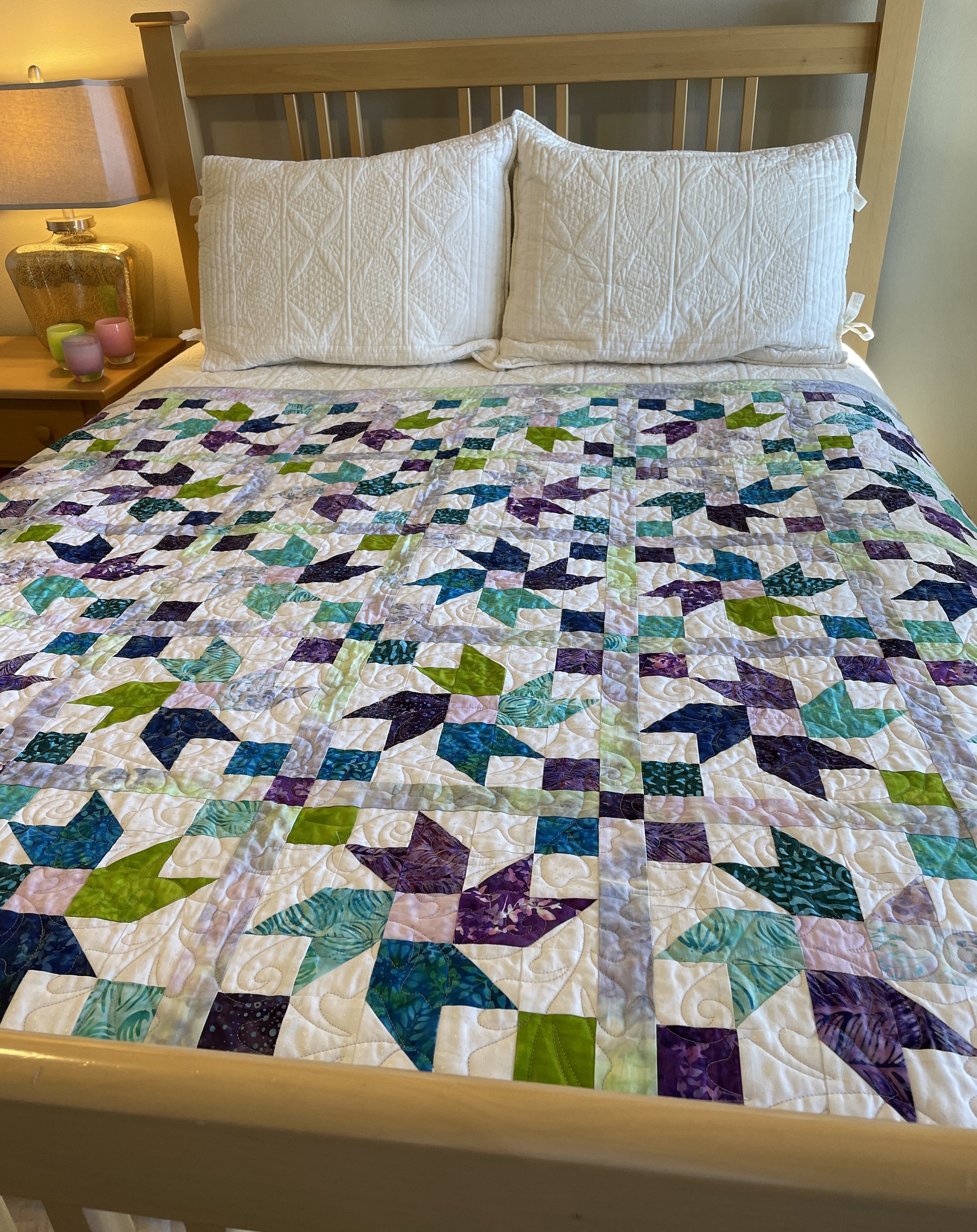 A Rich Quilt of Spinning Batik Flowers in Lilac, Dark Grape, Apple ...