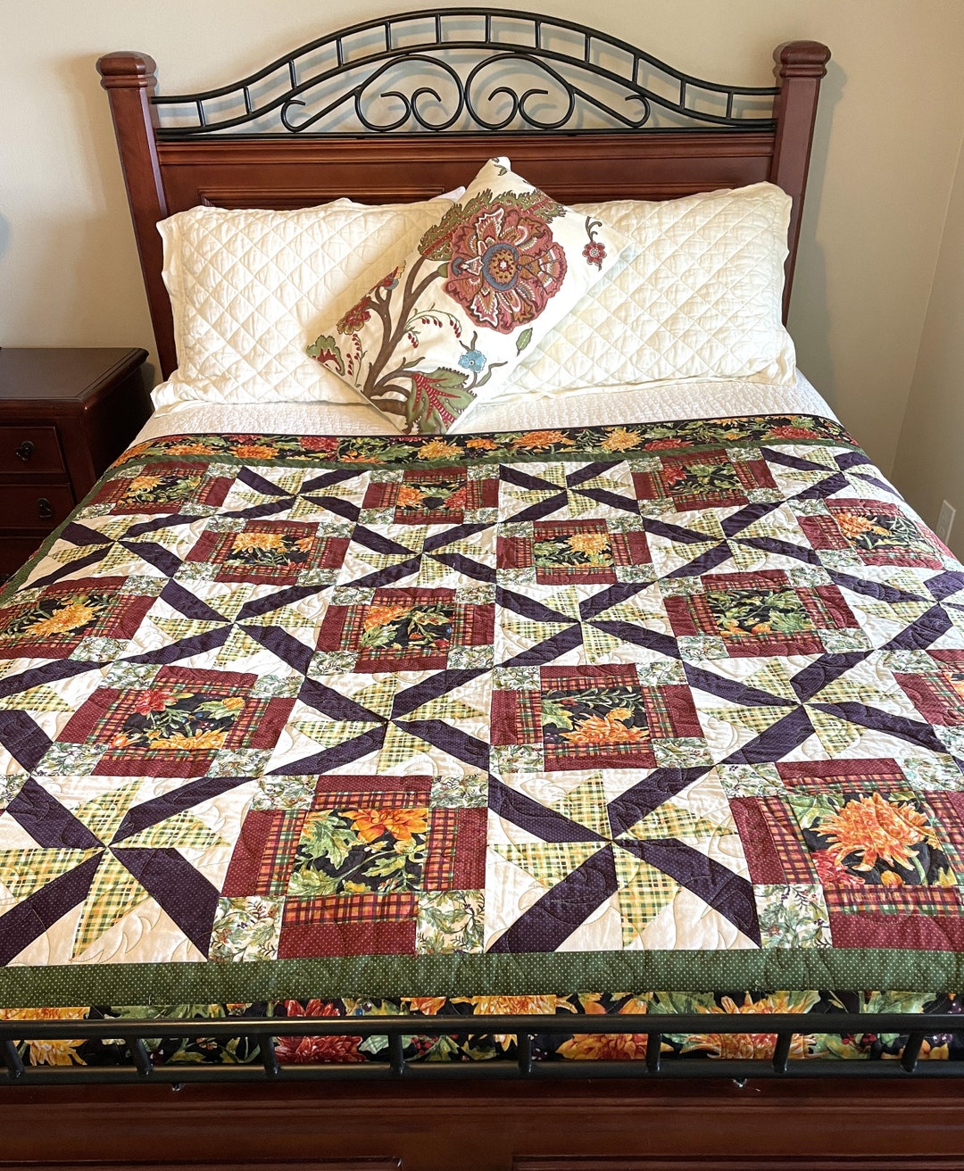 Awesome Floral Pinwheel Quilt of Orange, Rust, and Yellow Mums Among ...