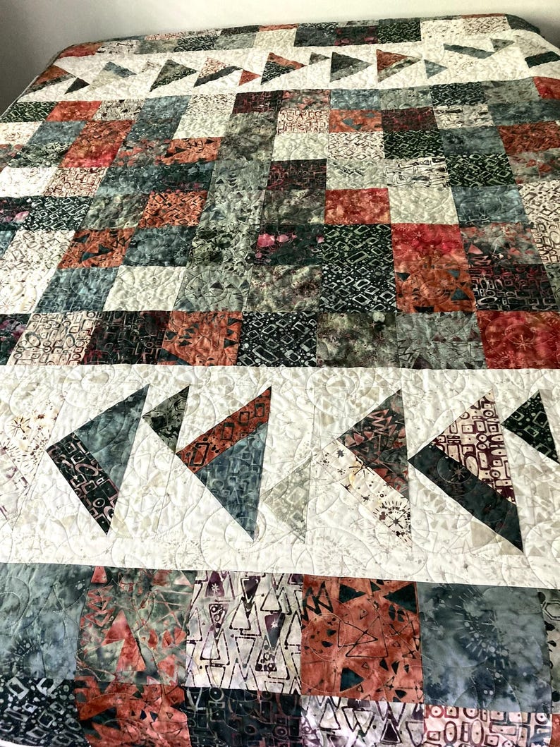 Our Flying South Quilt Features Batiks Blocks of Bold Warm and Beige ...