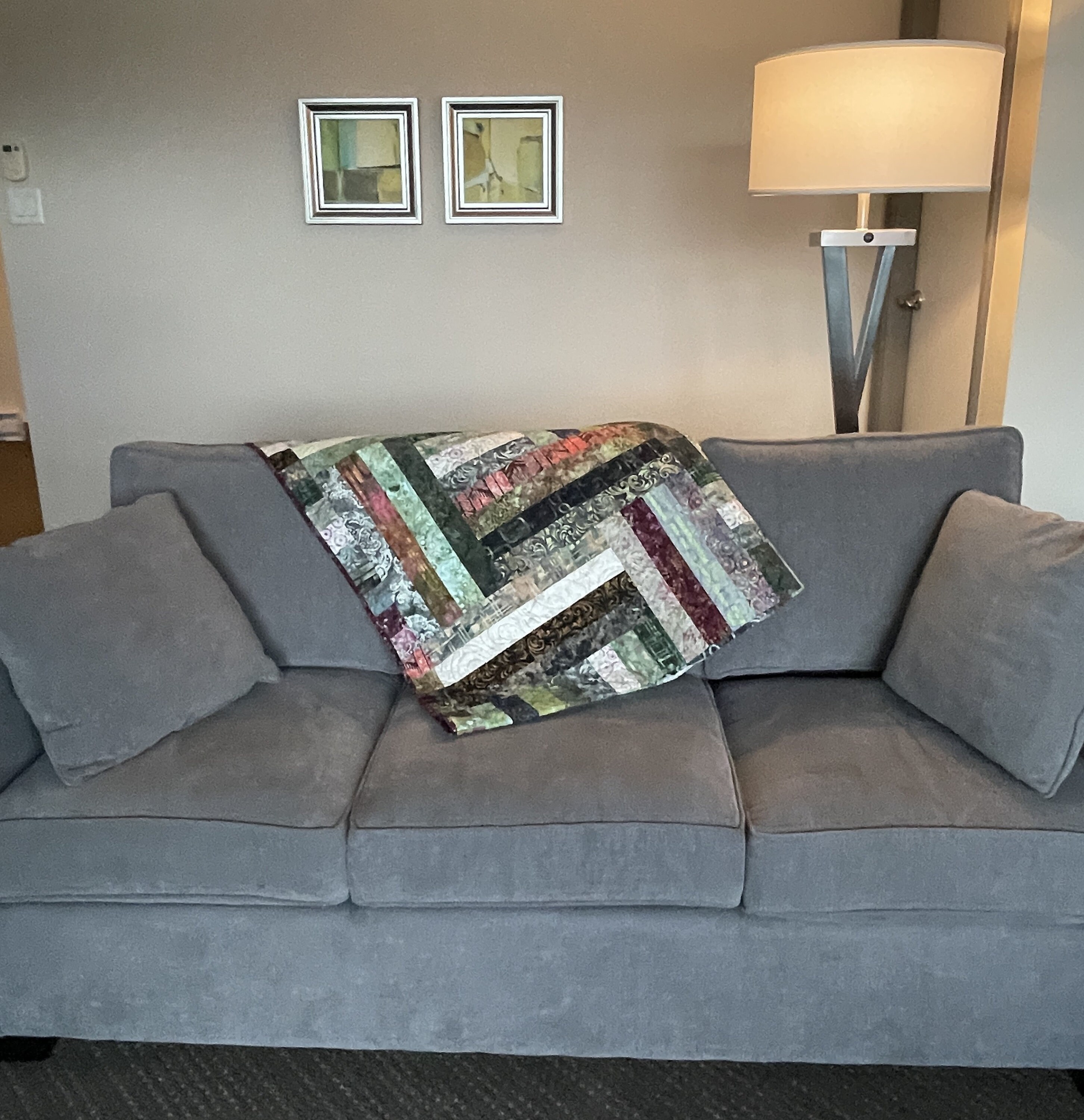 A Striking Batik Lap Quilt of Gray, Black, Green, Plum, and Burgundy ...