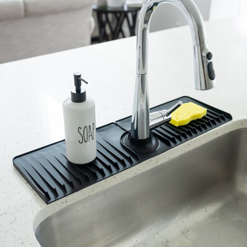 Kitchen & Bathroom Sink Splash Guard. High-tension Silicone. Protect ...