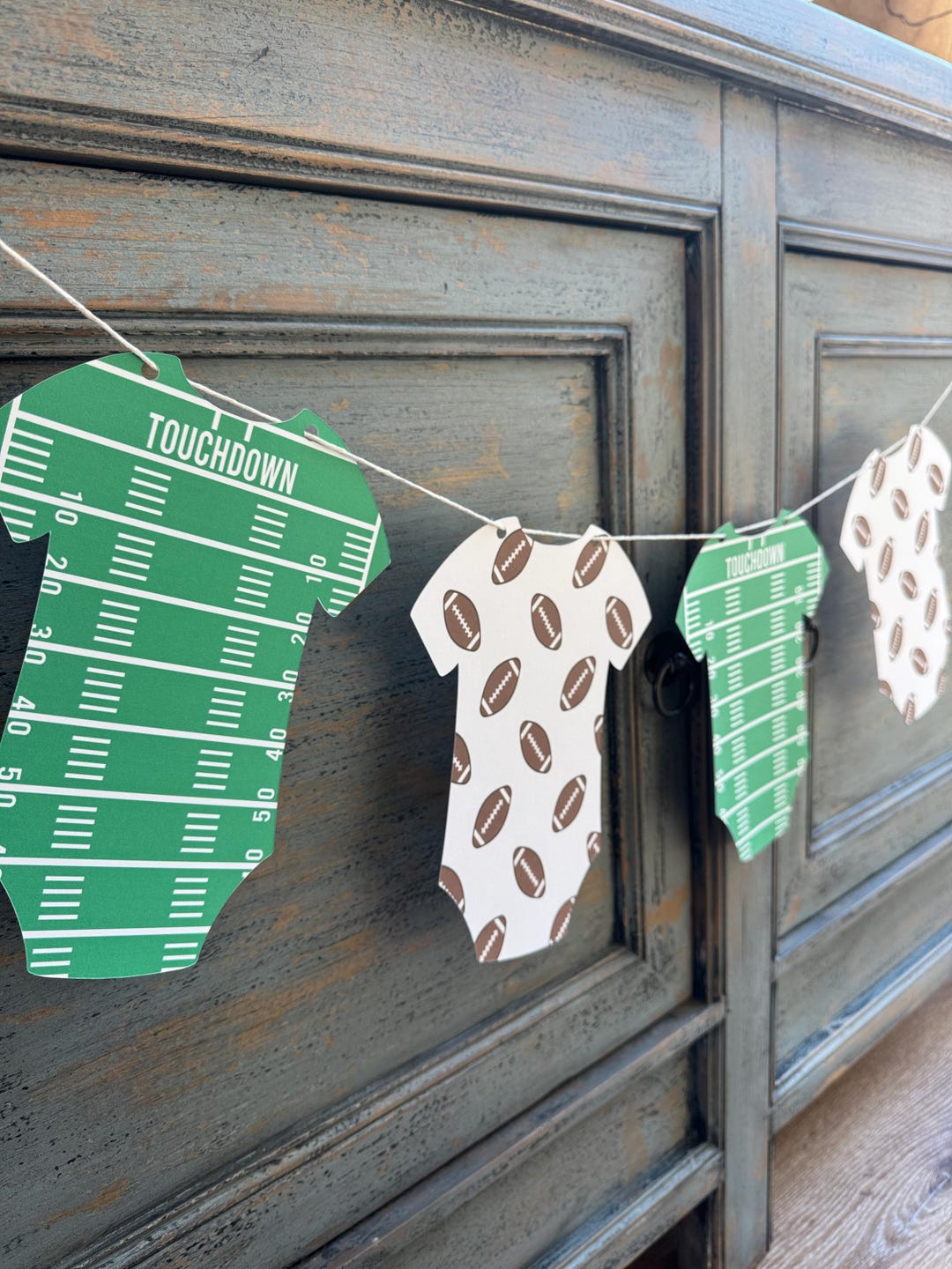 Football Baby Shower Banner: Little Kicker Cardstock Bodysuit Garland ...