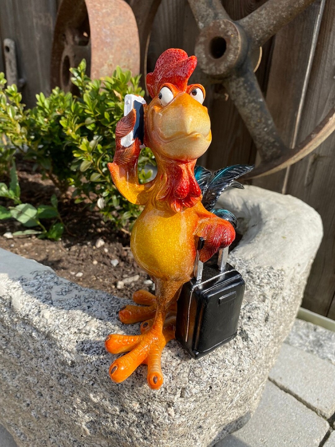 Artificial Stone Business Chicken Hillery With Suitcase and Mobile ...