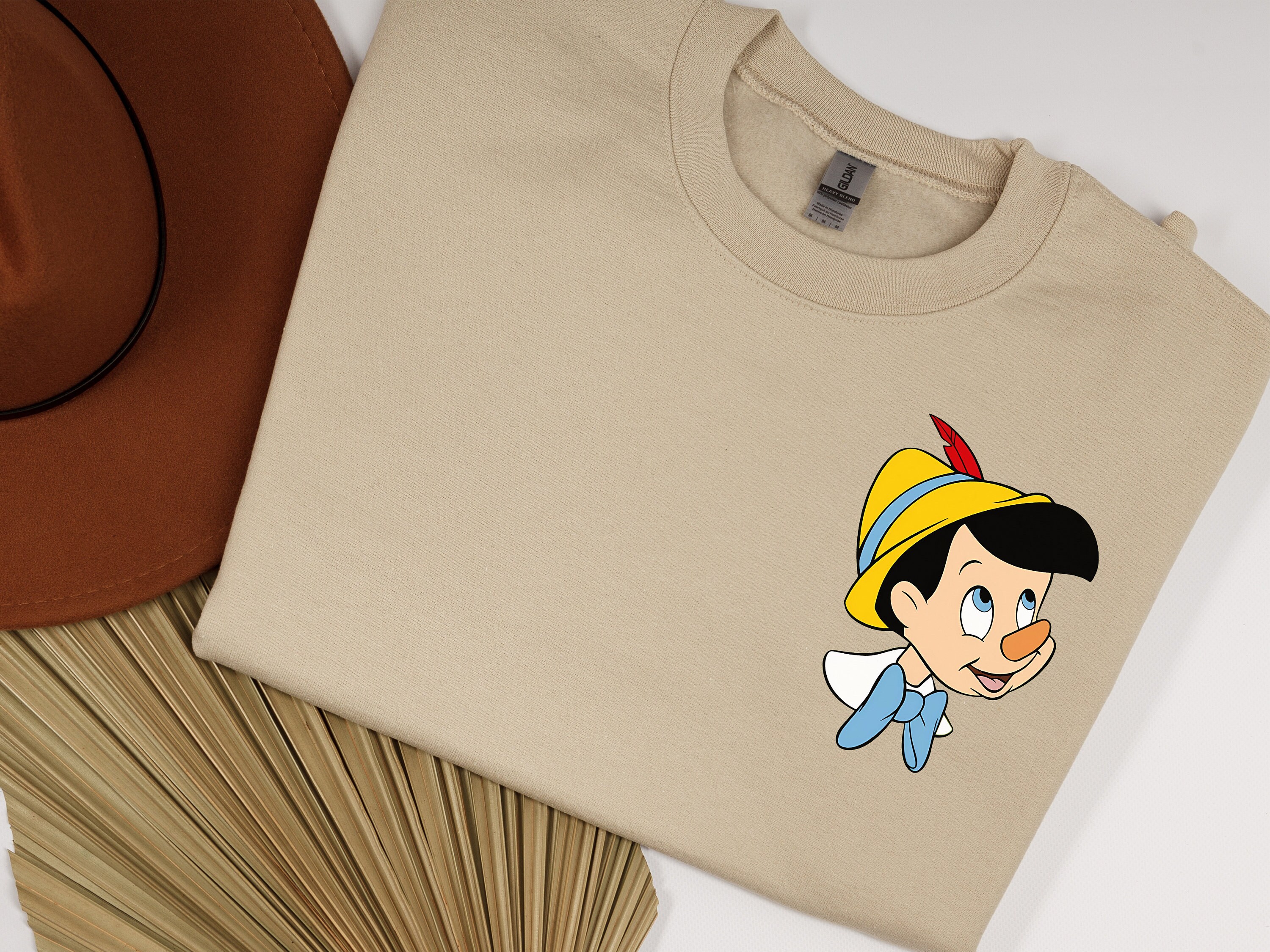 Cute Pinocchio Disney Sweatshirt, Vintage Pinocchio Pocket Design ...