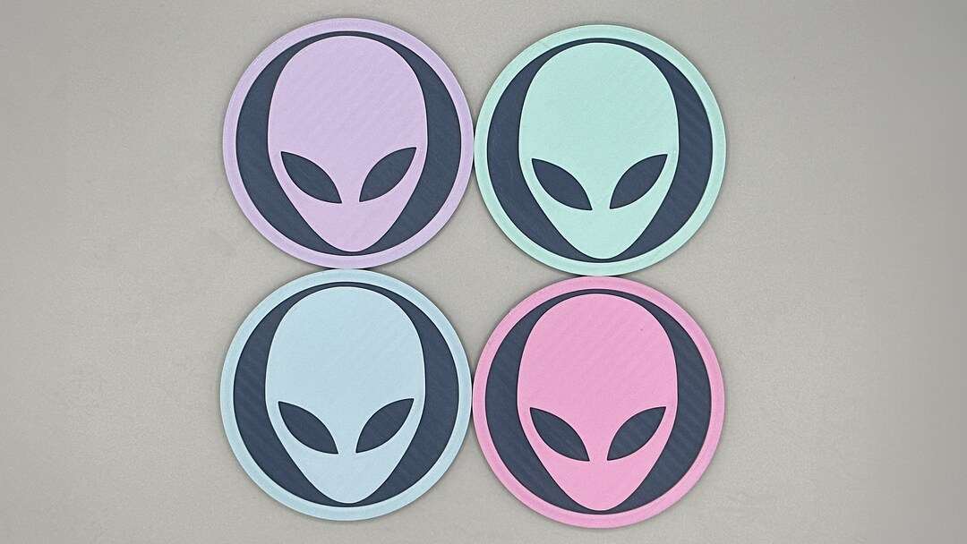 3D Printed Alien Coasters in Navy Blue and Pastel Blue/pink/purple set ...