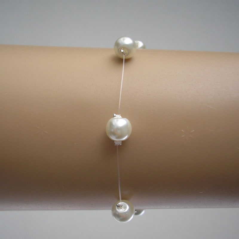 Floating Bracelet - Etsy