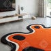 Amoeba Shape Hand Tufted Wool Rug Organic Shape Vibrant Orange & Black ...