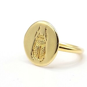 Round Scarab Signet Ring With an Engraved Beetle on the Surface. Yellow ...