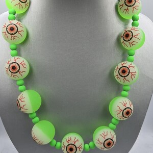 A Neckstravaganza Original Handmade Necklace: Evil Green Eyes. - Etsy