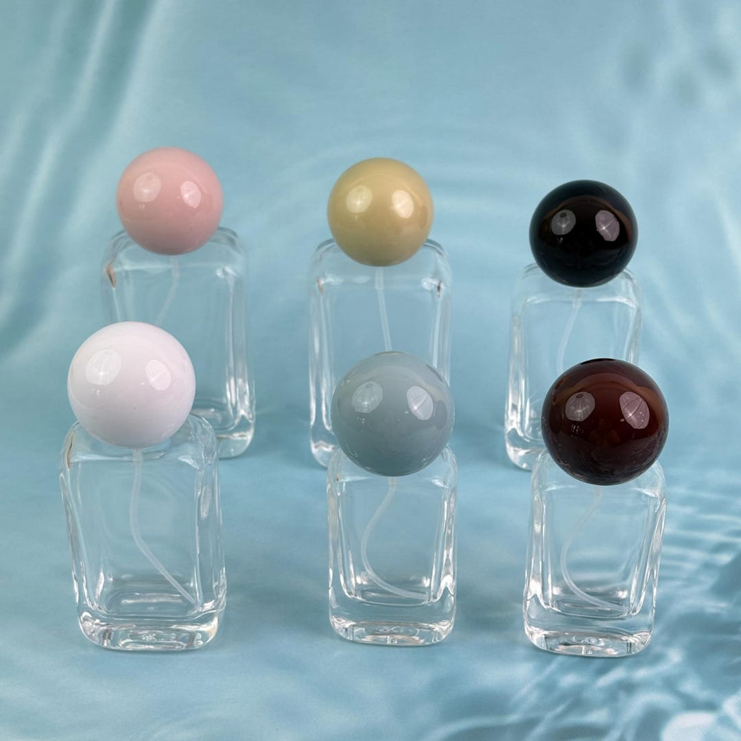 Elegant Glass Clear Spray Bottles With Colorful Sphere Caps ...