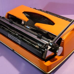Cursive Triumph Adler Contessa Deluxe Made in Germany Beautiful Orange ...