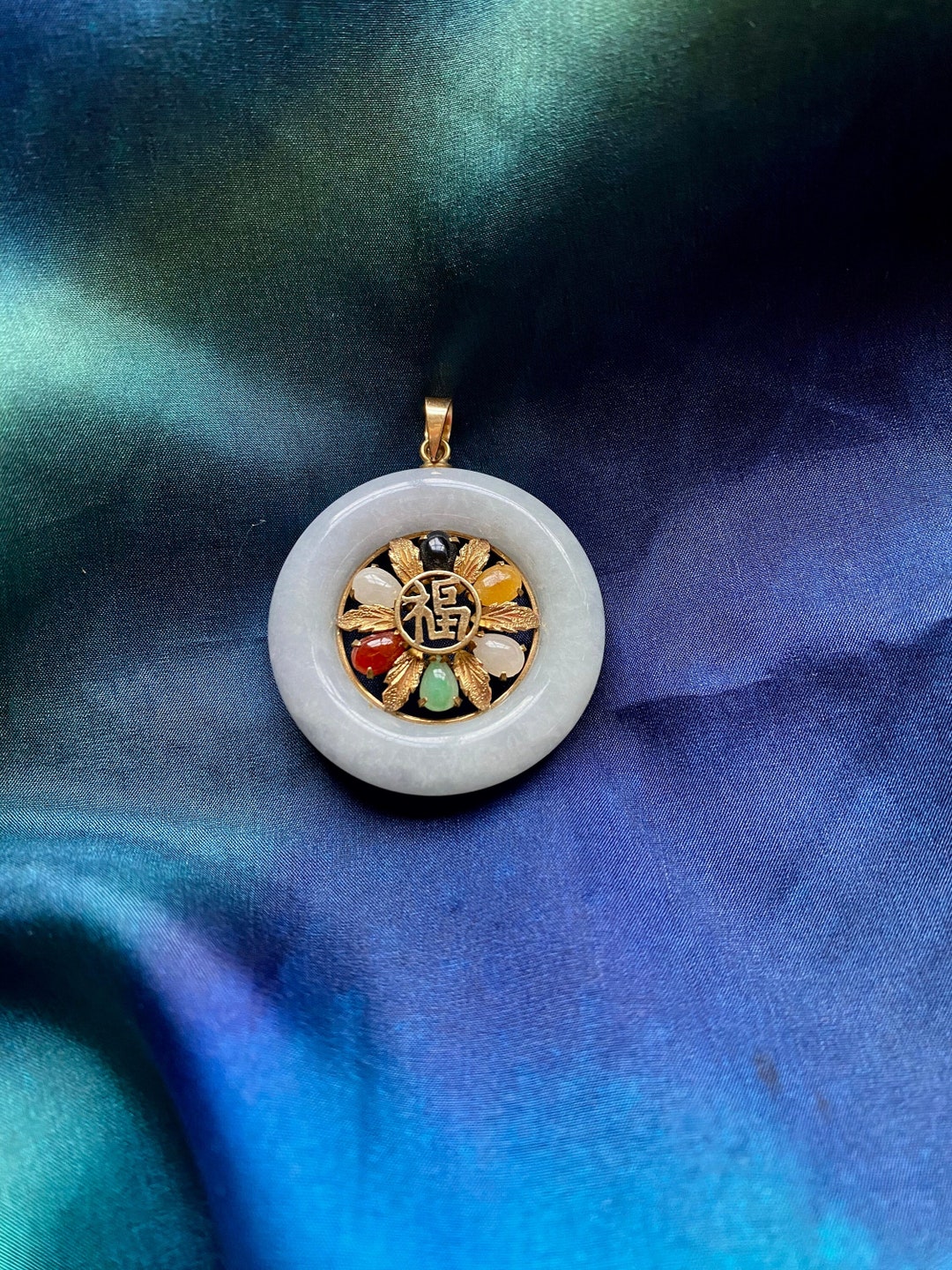 Multi Colors of Jade Set in 14K Gold Inserted in a Light Green Jade ...