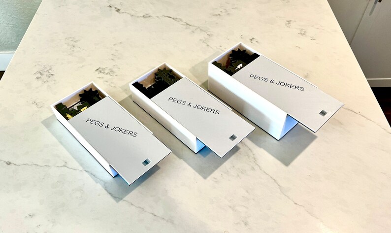 Pegs & Jokers 4 Board Game Set With Storage Box, 7 Pegs for Each Board ...