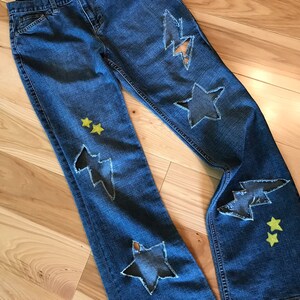 Destroyed Ripped Jeans With Cutouts, Embellished Edgy Stars and Bolts ...