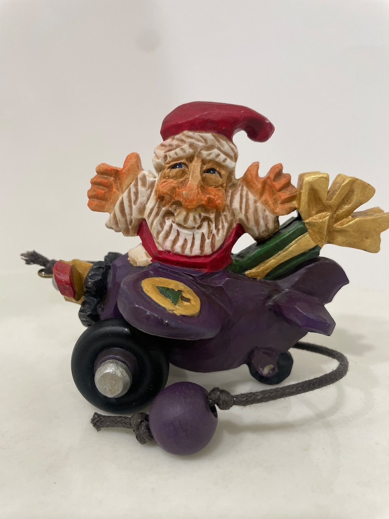 David Frykman Portfolio Christmas Collection Santa in Purple Airplane ...