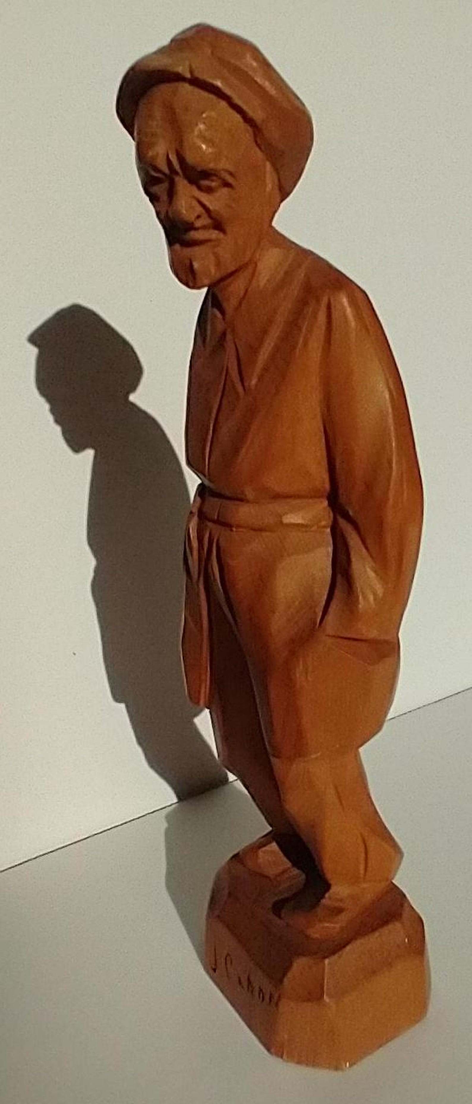 Jocelyn Caron's Hand Carved Wooden Statue of Old Man in Trench Coat ...