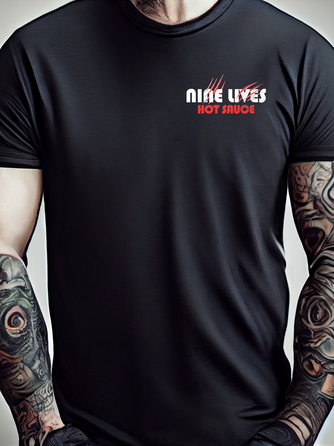 Nine Lives Logo T-shirt | Elevate Your Style With Hot Sauce Clothing ...