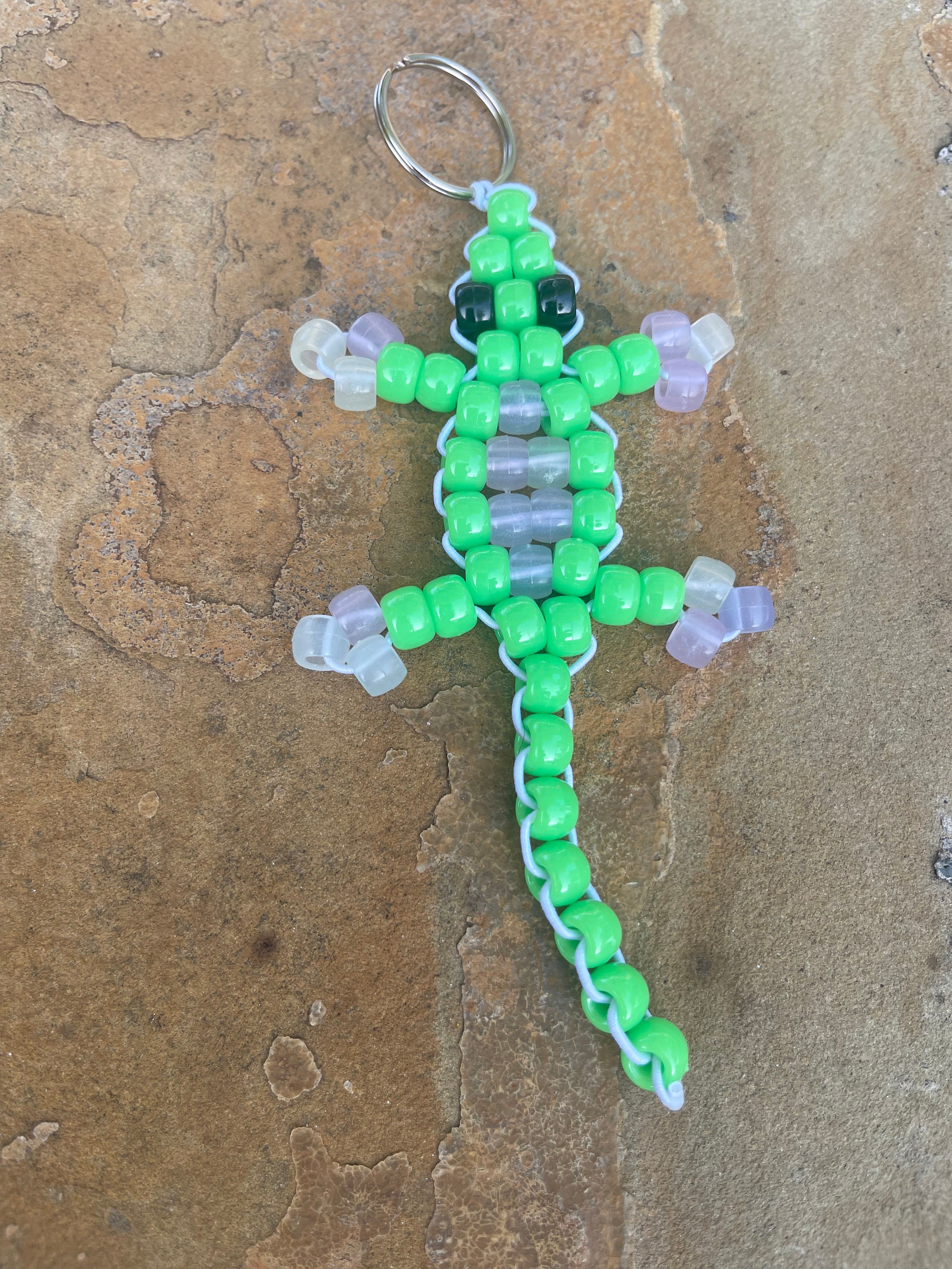 1. "handmade UV Color Changing Bead Lizard Keychain, Glow in the Dark ...