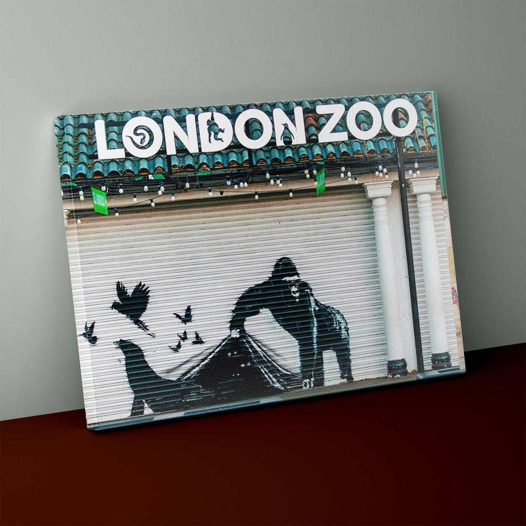 Banksy London Zoo Artwork - New Gorilla Holding Metal Shutter Helping ...
