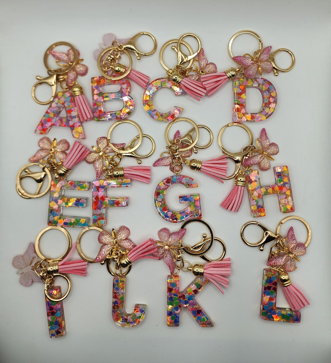Pink Resin Alphabet Keychains With Tassel and Butterfly Charm ...