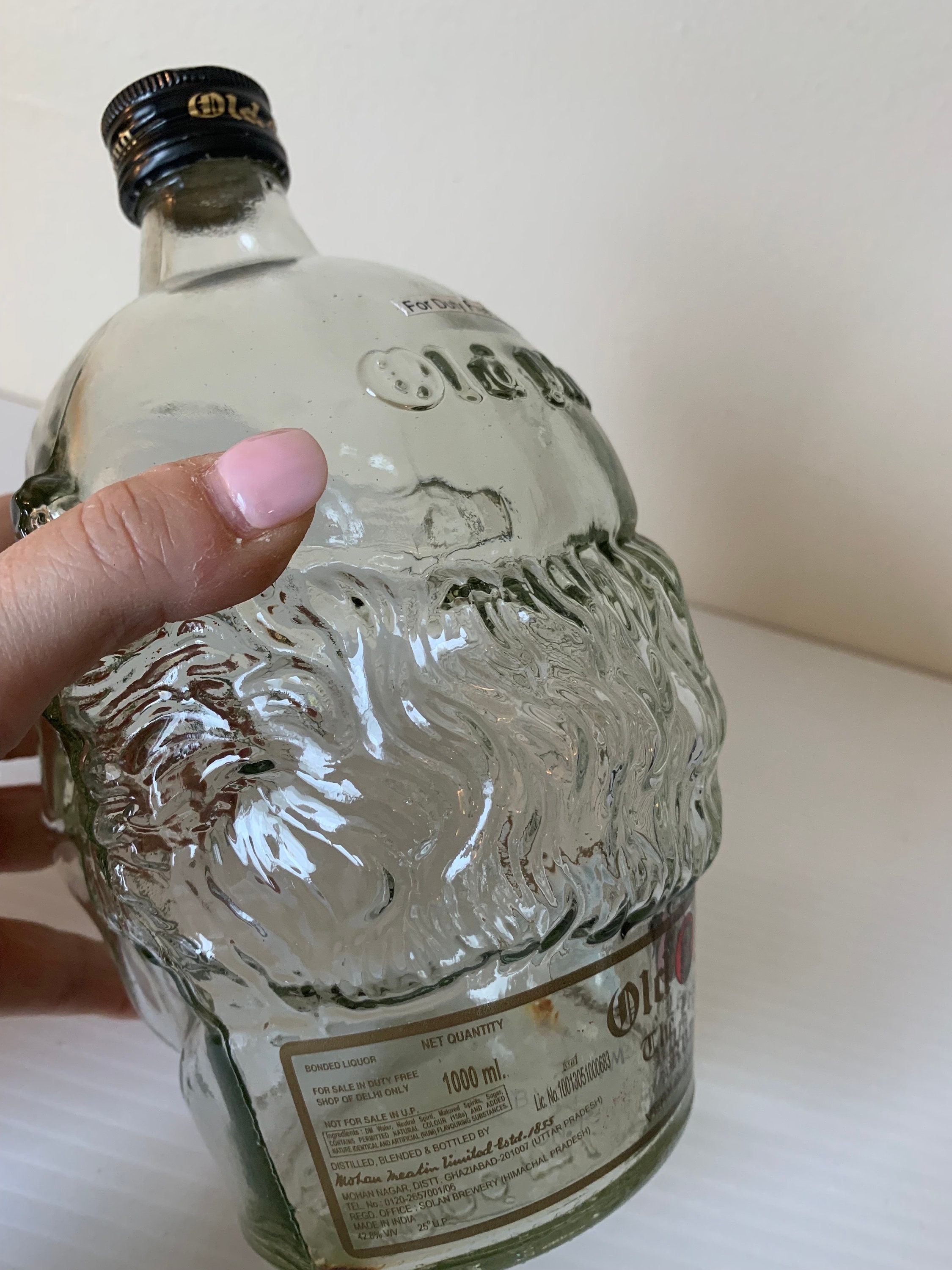 Quirky Vintage Empty Old Monk Bottle: Unique Face-shaped Rum Bottle for ...