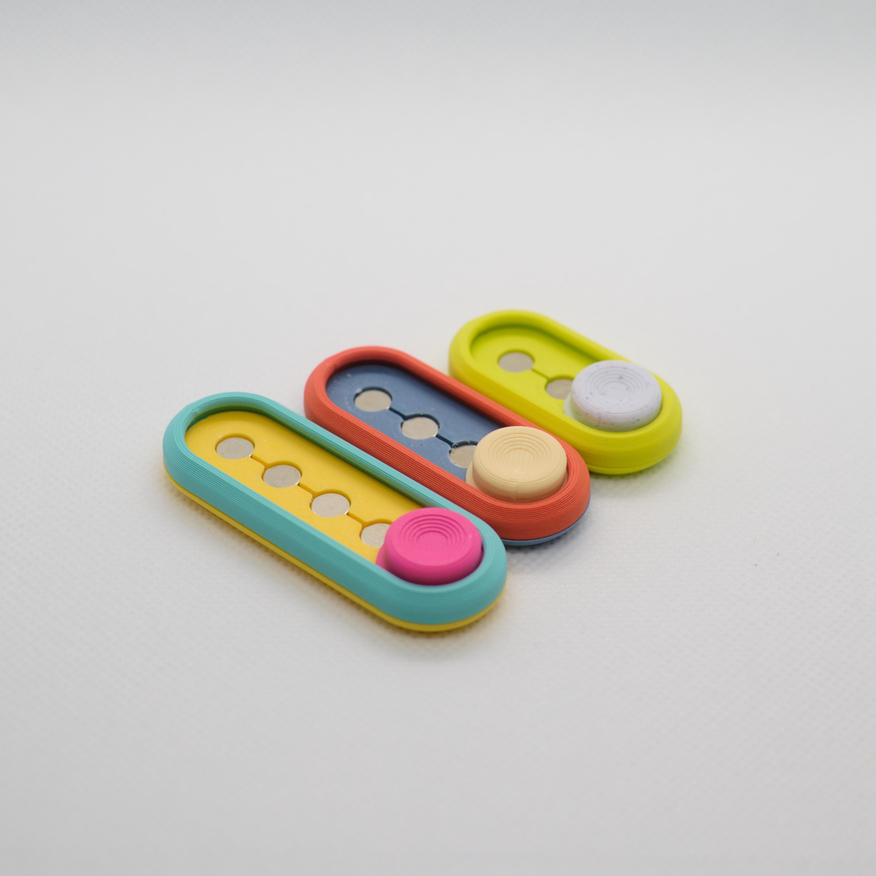 Stretched 3D Printed Customizable Magnetic Haptic Slider Keychain ...